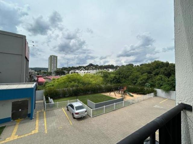 Apartamento no Operário/NH 2 dor. com sacada c/churr.,garagem, cond.com piscina,s.festas, elevador