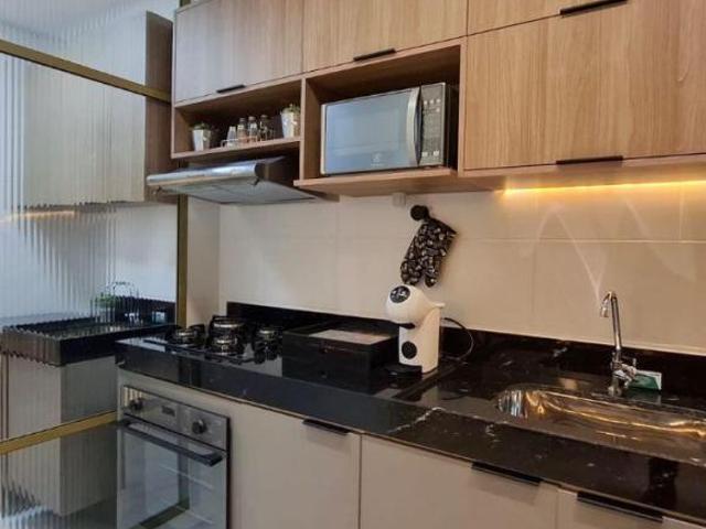 Apartamento no Parque Industrial com 2 quartos varanda gourmet em andar alto com sol da manhã
