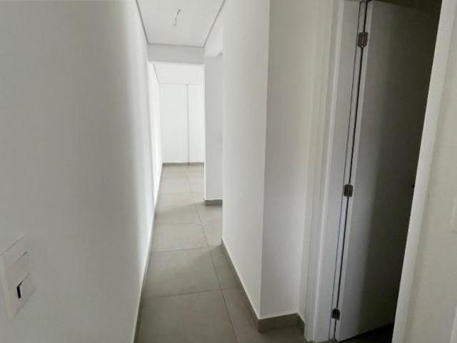 Apartamento novo à venda em Santos SP, Vila Rica/Boqueirão: frente, 2 suítes, varanda, sala e coz in