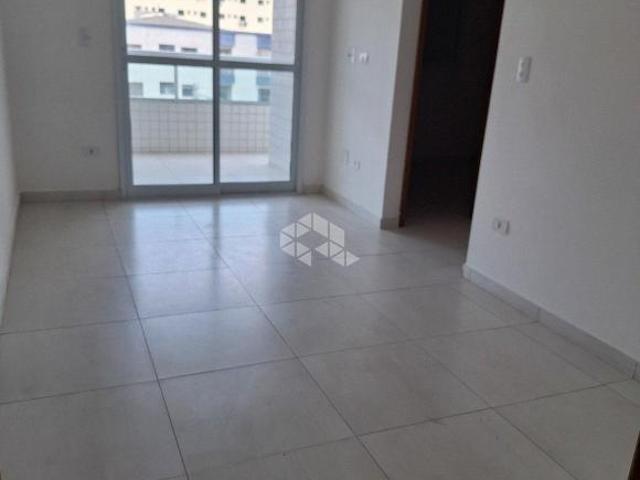 Apartamento novo a venda na Praia grande, bairro ocian com 2 quartos, 1 suite e 1 vaga!