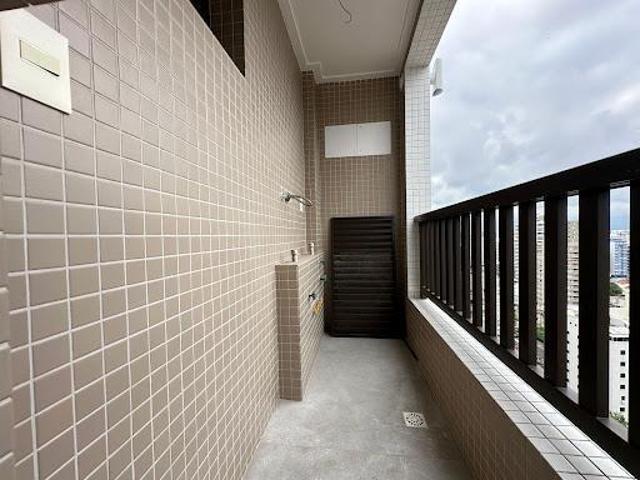 Apartamento novo com 3 quartos e 2 vagas privativas com vista mar no Canto do Forte em Praia Grande