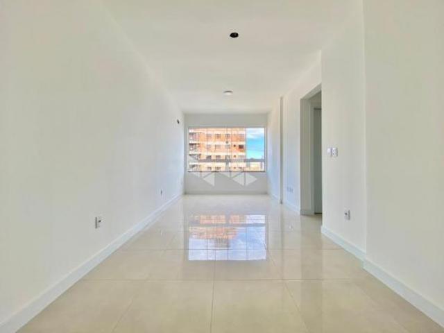 Apartamento Novo de 2 dormitórios 1 suíte com box térreo na Zona Nova em Capão da Canoa