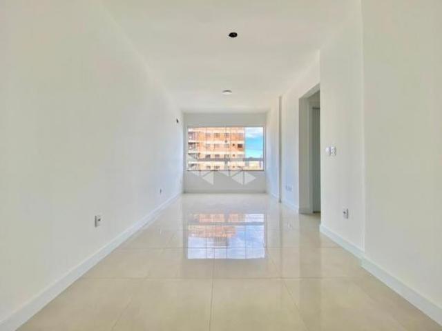 Apartamento Novo de 2 dormitórios 1 suíte com box térreo na Zona Nova em Capão da Canoa