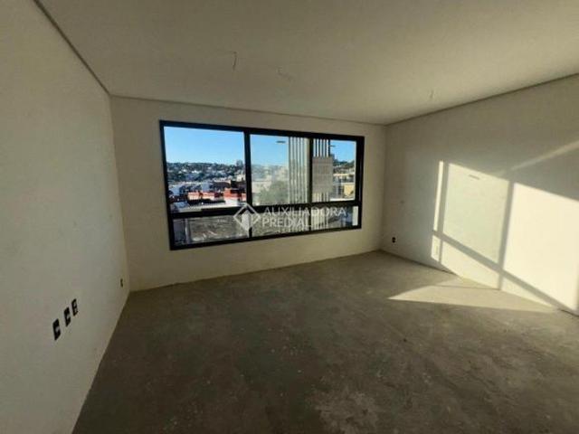Apartamento novo de 2 dormitórios, 1 suíte e vaga de garagem no bairro Três Figueiras