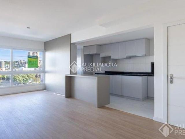 Apartamento novo de 3 dormitórios, 1 suíte, 2 vagas de garagem no Menino Deus