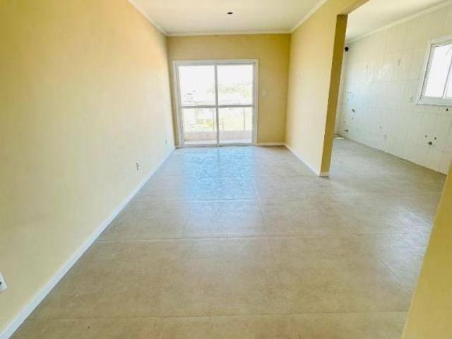 Apartamento novo em excelente localização na Praia do Cassino