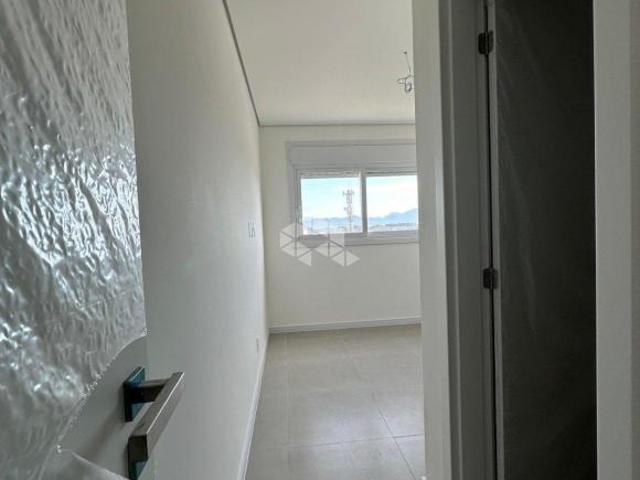 Apartamento novo 2 dormitórios, 1 suíte na cidade Capão da Canoa
