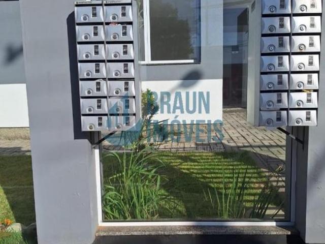 Apartamento novo 2 dormitórios com churrasqueira na parada 68 a 800 metros da Av Principal