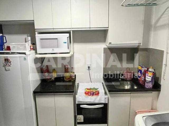 Apartamento padrão Com armários planejados na cozinha, lavanderia e banheiro