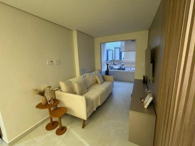 Apartamento para venda em Canto Do Forte de 58.00m² com 2 Quartos, 1 Suite e 1 Garagem