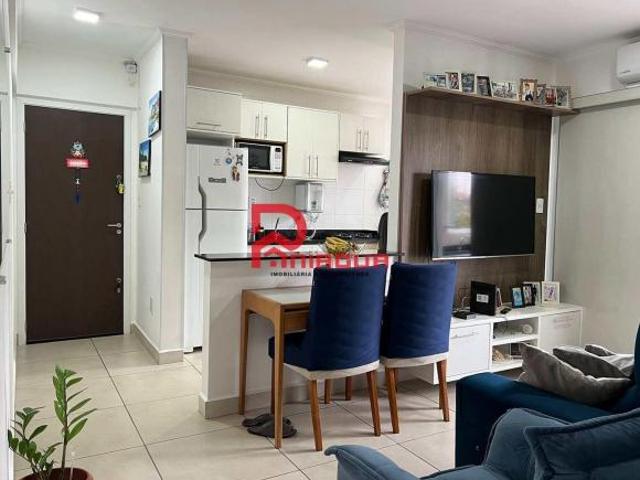 Apartamento para venda em Guilhermina de 64.00m² com 2 Quartos, 1 Suite e 1 Garagem