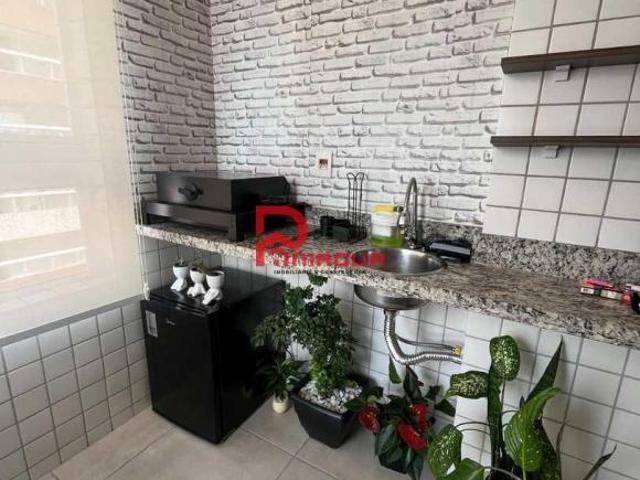 Apartamento para venda em Guilhermina de 64.00m² com 2 Quartos, 1 Suite e 1 Garagem