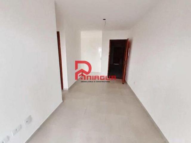Apartamento para venda em Guilhermina de 60.00m² com 2 Quartos, 1 Suite e 1 Garagem