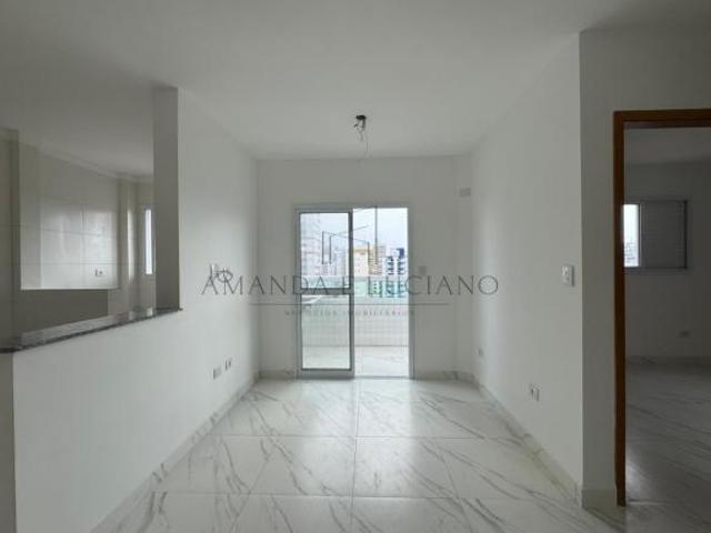 Apartamento para Venda em Praia Grande, Guilhermina, 1 dormitório, 1 suíte, 1 vaga e vista mar