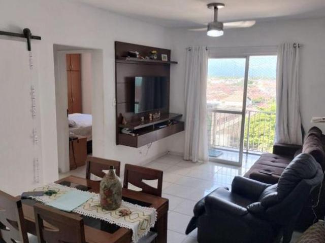 Apartamento pé na areia, com 1 dormitório, sacada vista mar e 1 vaga de garagem demarcada