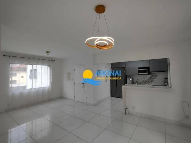 Apartamento próximo à praia com sacada — Enseada — Guarujá