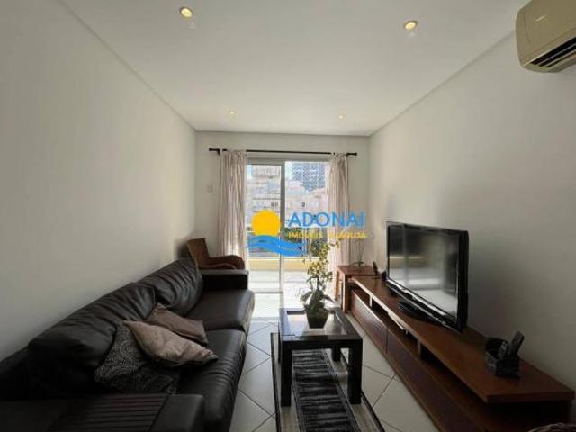 Apartamento próximo à praia com sacada — Enseada — Guarujá