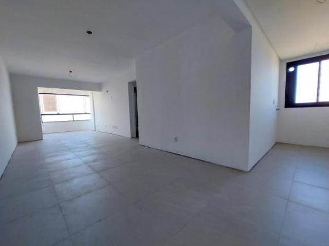 Apartamento pronto para morar, no centro de Tramandaí e a poucos passos do mar, com uma vista panorâ