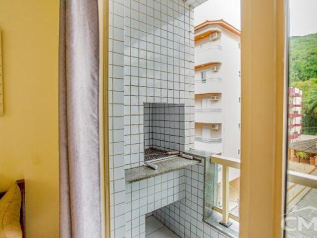 Apartamento Praia Grande 2 quartos, sendo 1 suíte, a passos da praia por apenas R$ 730.000