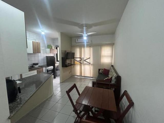 APARTAMENTO PRAIA GRANDE com 1 dormitório,1 vaga de garagem,sala e cozinha