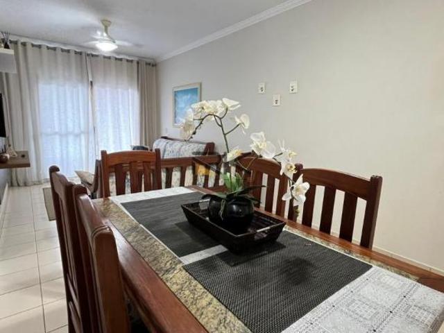 APARTAMENTO PRAIA GRANDE com 1 suíte,1 vaga de garagem,varanda,sala de estar e jantar
