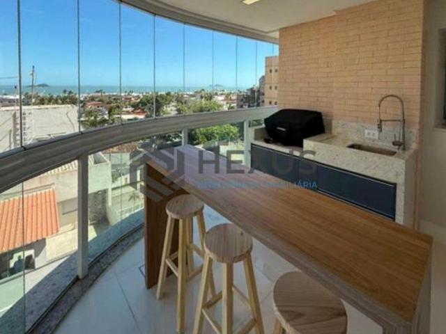 Apartamento reformado com varanda gourmet e lazer na Praia da Enseada, Guaruja
