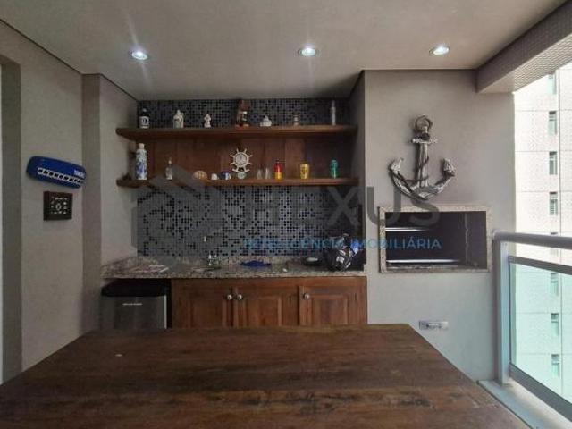 Apartamento reformado com varanda gourmet e vista mar na Praia das Asturias, Gua