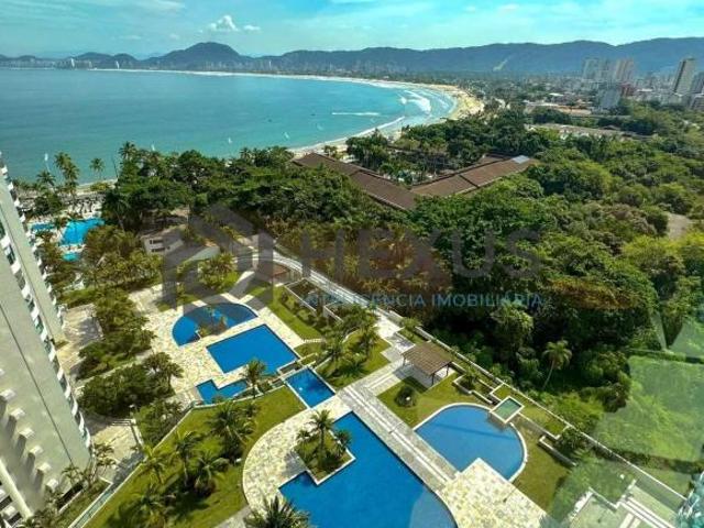 Apartamento reformado com varanda vista mar e lazer na beira mar da praia na Ens