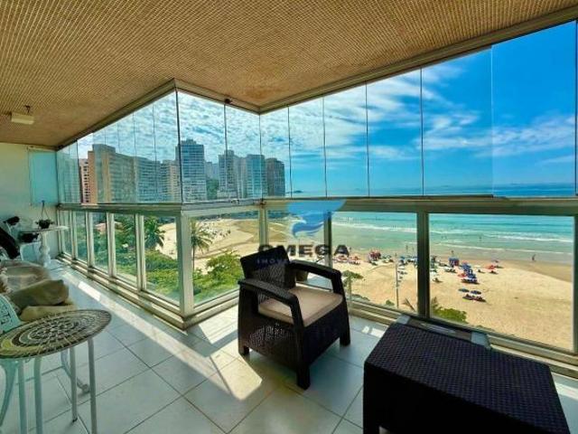Apartamento reformado com vista mar à venda na praia das Pitangueiras no Guarujá I Omega Imoveis