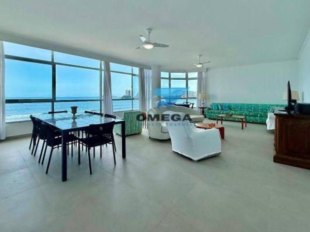Apartamento reformado com vista mar à venda na Praia das Pitangueiras no Guarujá I Omega Imoveis
