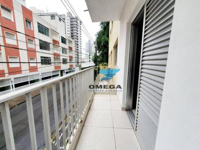 Apartamento reformado a uma quadra da Praia das Astúrias com 2 dormitórios à venda Jardim Astúrias