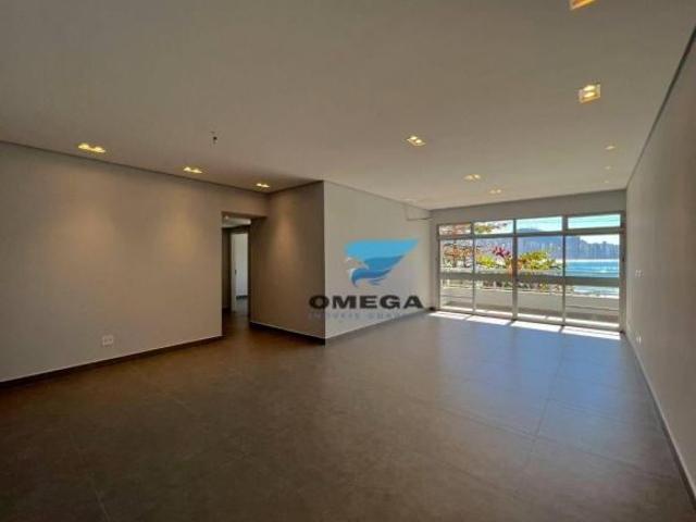 Apartamento reformado à venda frente mar em praia das Astúrias no Guarujá
