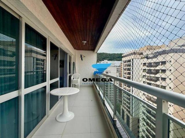 Apartamento reformado à venda na praia das Pitangueias no Guarujá I Omega Imoveis