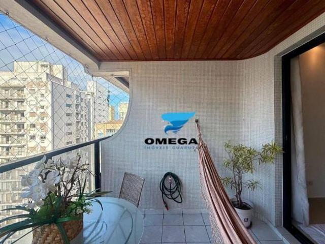 Apartamento reformado à venda na praia das Pitangueiras no Guarujá I Omega Imoveis