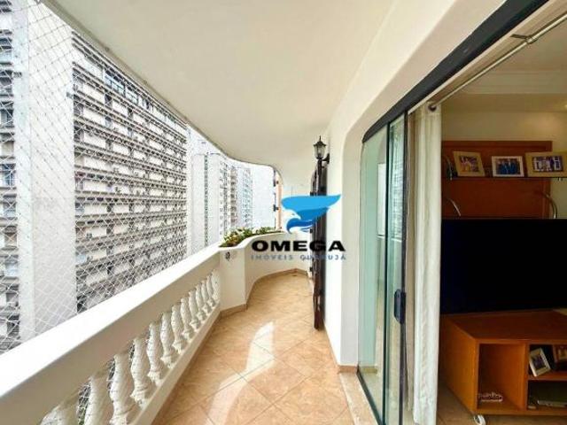 Apartamento reformado à venda na Praia das Pitangueiras no Guarujá I Omega Imoveis