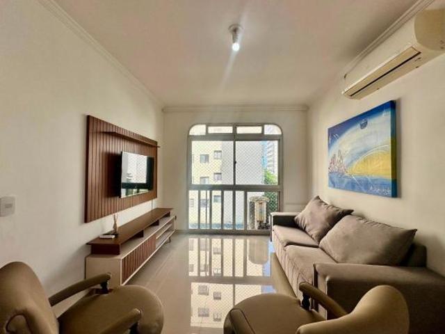 Apartamento reformado à venda na Praia das Pitangueiras no Guarujá | Omega Imóveis