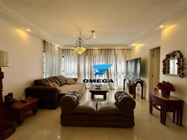 Apartamento reformado à venda na Praia das Pitangueiras no Guarujá | Omega Imóveis
