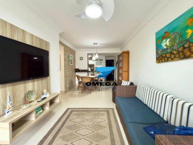 Apartamento reformado à venda praia do Tombo no Guarujá I Omega Imoveis