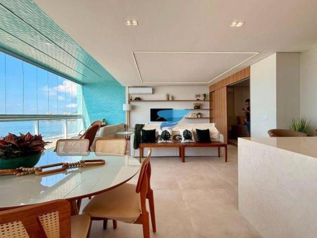 Apartamento reformado em frente ao mar à venda na praia das Pitangueiras no Guarujá I Omega Imoveis