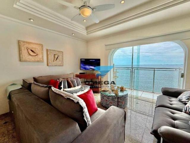 Apartamento reformado frente mar à venda na praia das Pitangueiras no Guarujá I Omega Imoveis