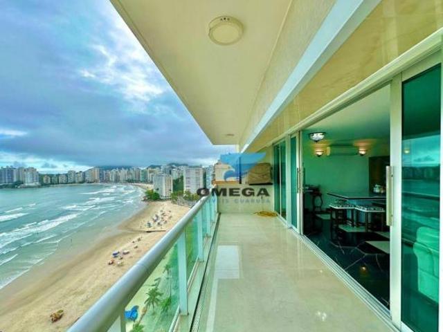 Apartamento reformado frente mar à venda na Praia das Pitangueiras no Guarujá I Omega Imoveis