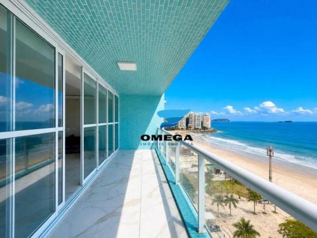 Apartamento reformado frente mar à venda na praia das Pitangueiras no Guarujá I Omega Imoveis