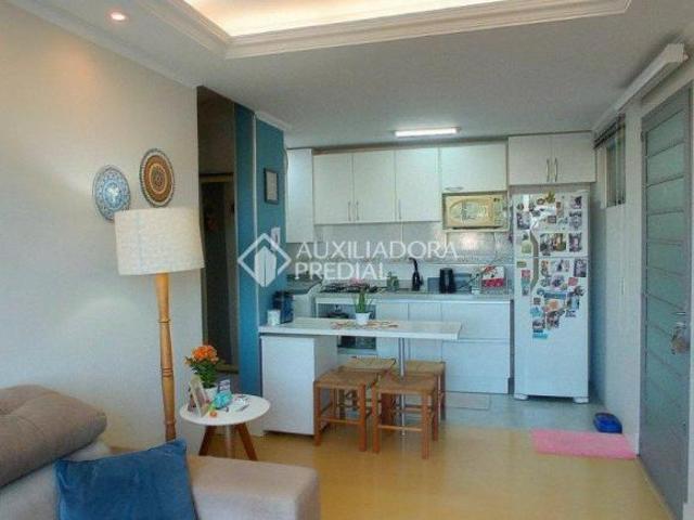 Apartamento residencial com 3 dormitórios e 1 vaga à venda no bairro Sarandi em Porto Alegre com 52