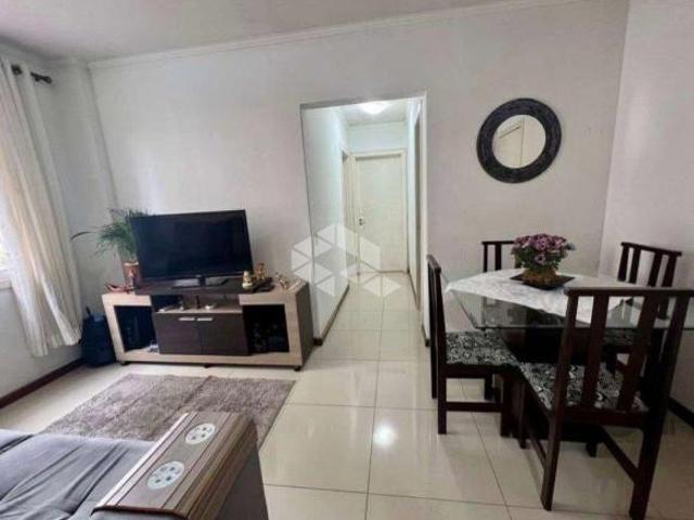Apartamento semi mobiliado 2 dormitorio e vaga escriturada a venda no bairro Partenon