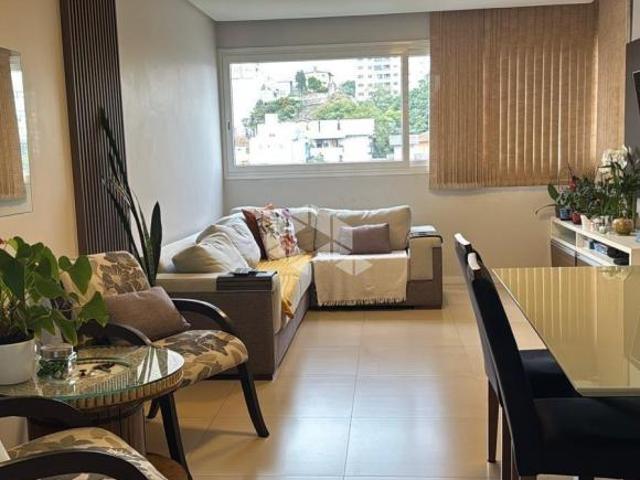 Apartamento semi mobiliado, 2 dormitórios sendo 1 suíte e 2 vagas de garagem
