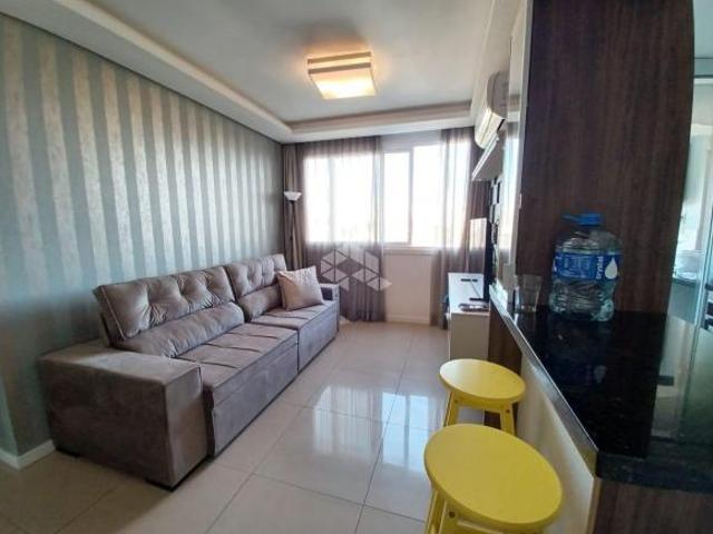 Apartamento semi mobiliado 2 dormitórios 1 suíte, 1 vaga andar alto Centro Canoas