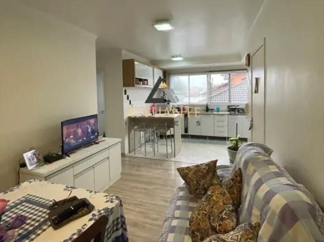 Apartamento semi mobiliado com 2 dormitórios e 2 vagas em Caxias do Sul