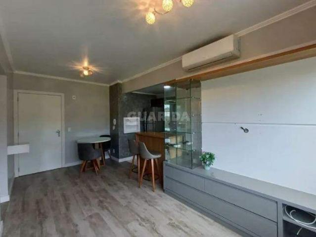 Apartamento semi mobiliado com 2 dormitórios para locação no bairro Camaquã COD: 25497