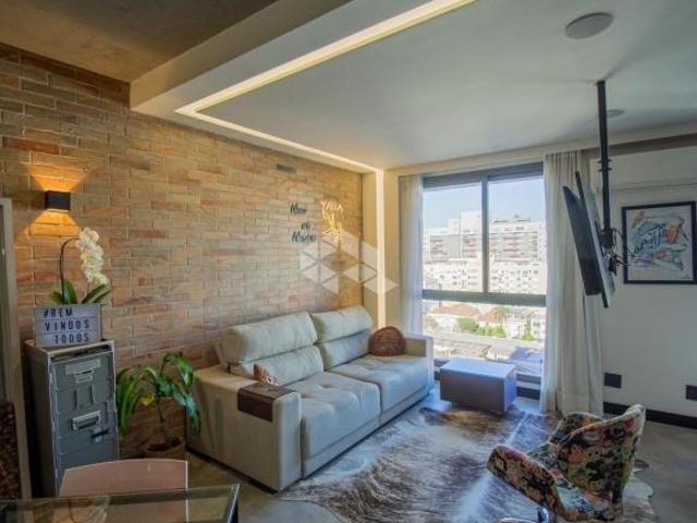 Apartamento semi mobiliado de 1 quarto com garagem coberta na Cidade Baixa