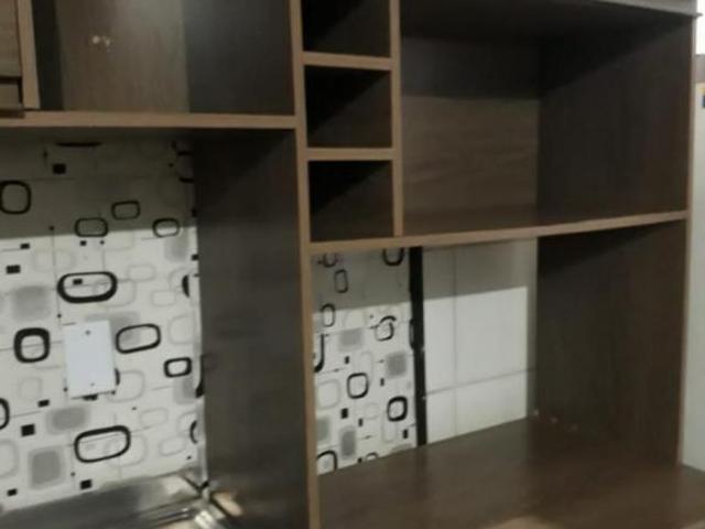 Apartamento semi mobiliado de 2 dormitórios, 1 suíte, com vaga no Bairro Olaria